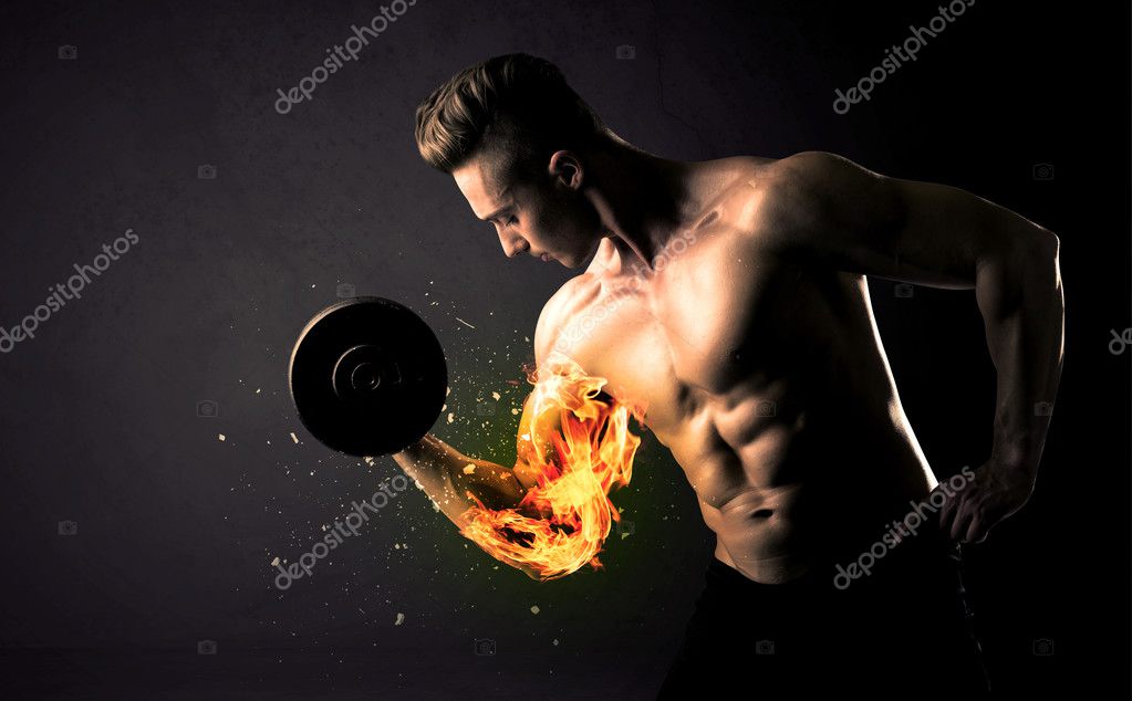 Bodybuilder athlete lifting weight with fire explode arm concept ...