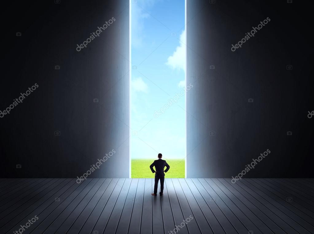 Businessman walking to open gate — Stock Photo © ra2studio #91641402