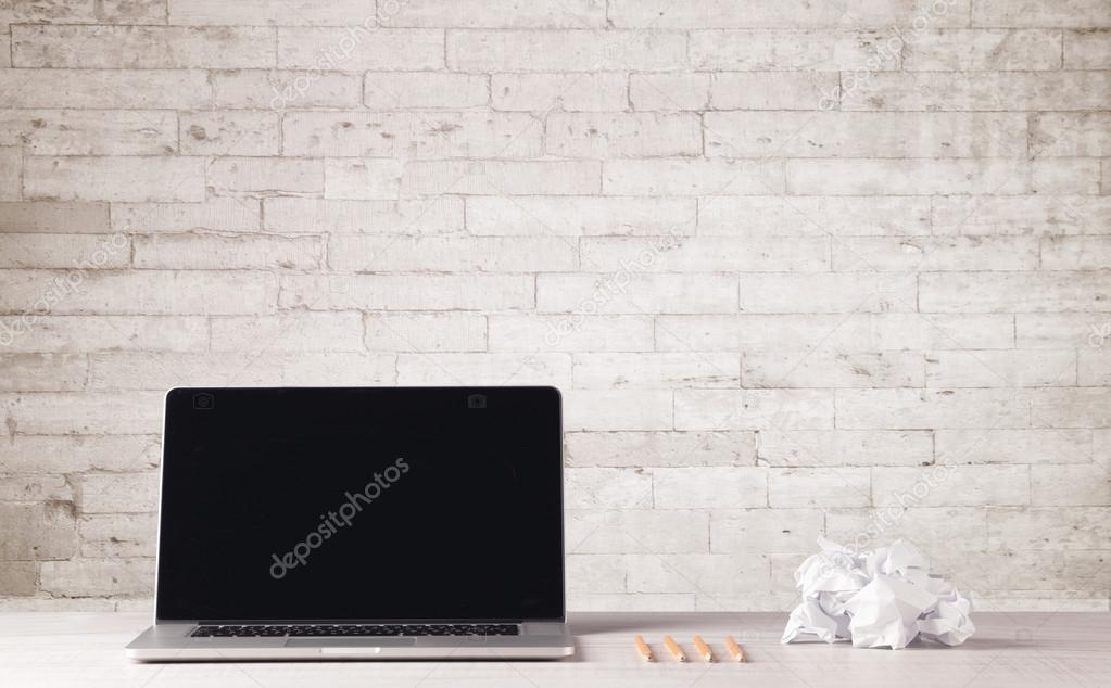 Business laptop with white brick wall Stock Photo by ©ra2studio 94962232