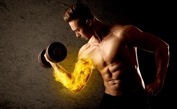 Bodybuilder athlete lifting weight with fire explode arm concept Stock ...