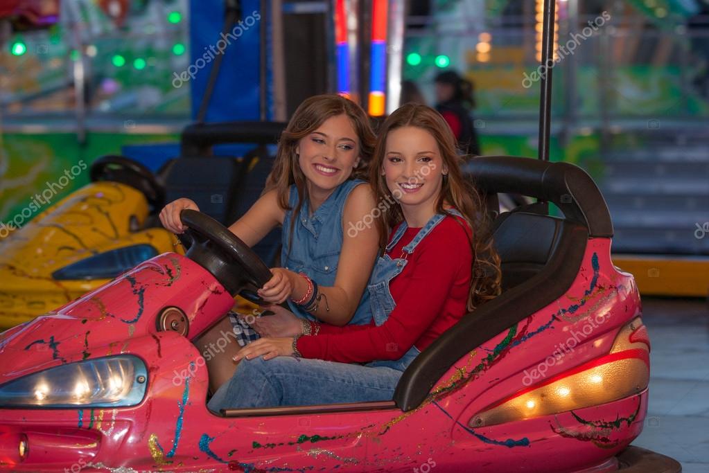 Kids at fair ground riding bumper cars — Stock Photo © mandygodbehear ...