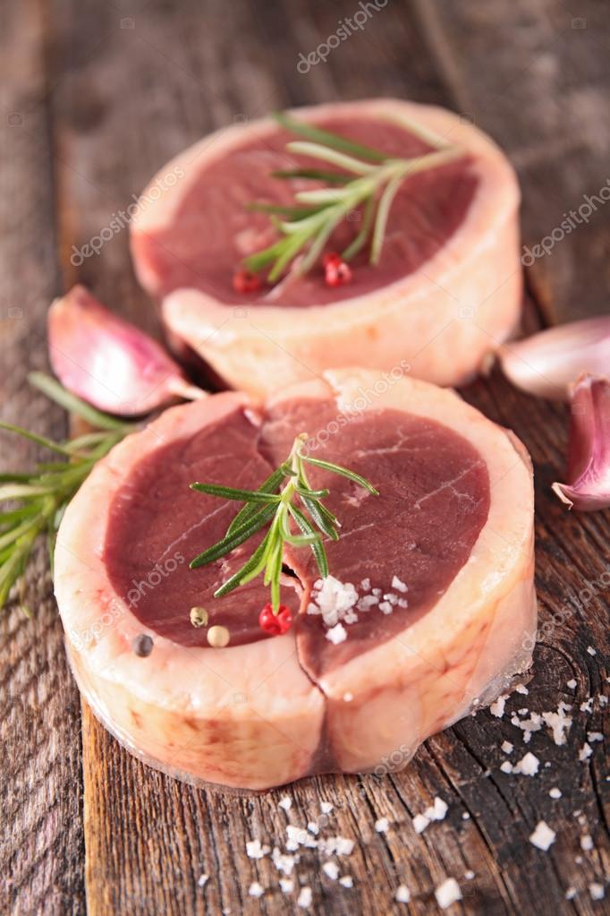 Raw meat on woode background Stock Photo by ©studioM 69207077