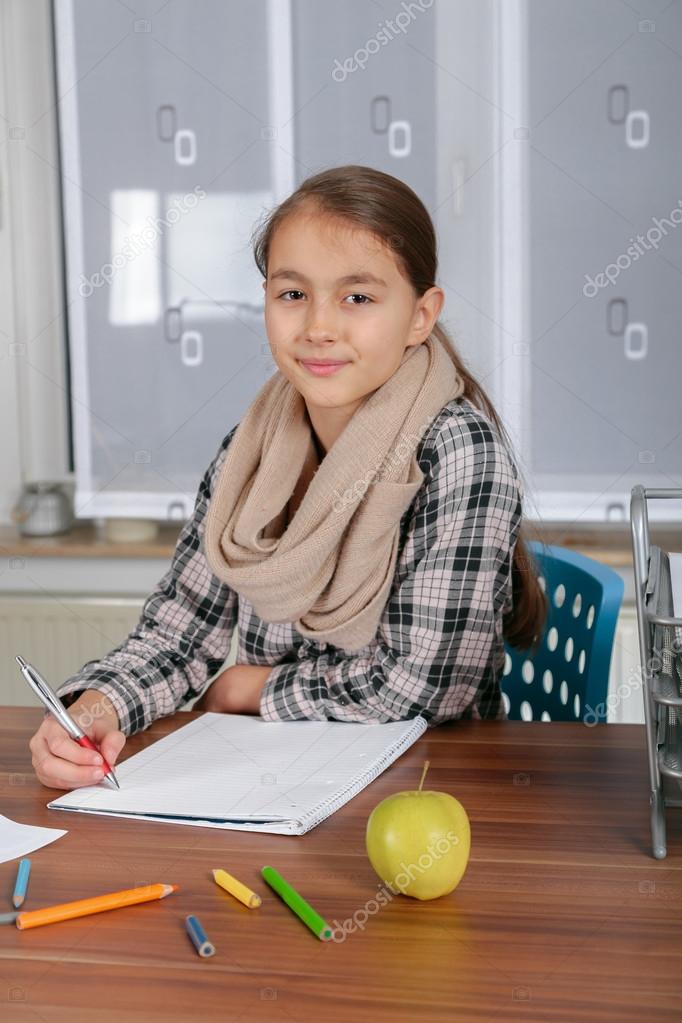Little girl working on her school project at home. — Stock Photo ...