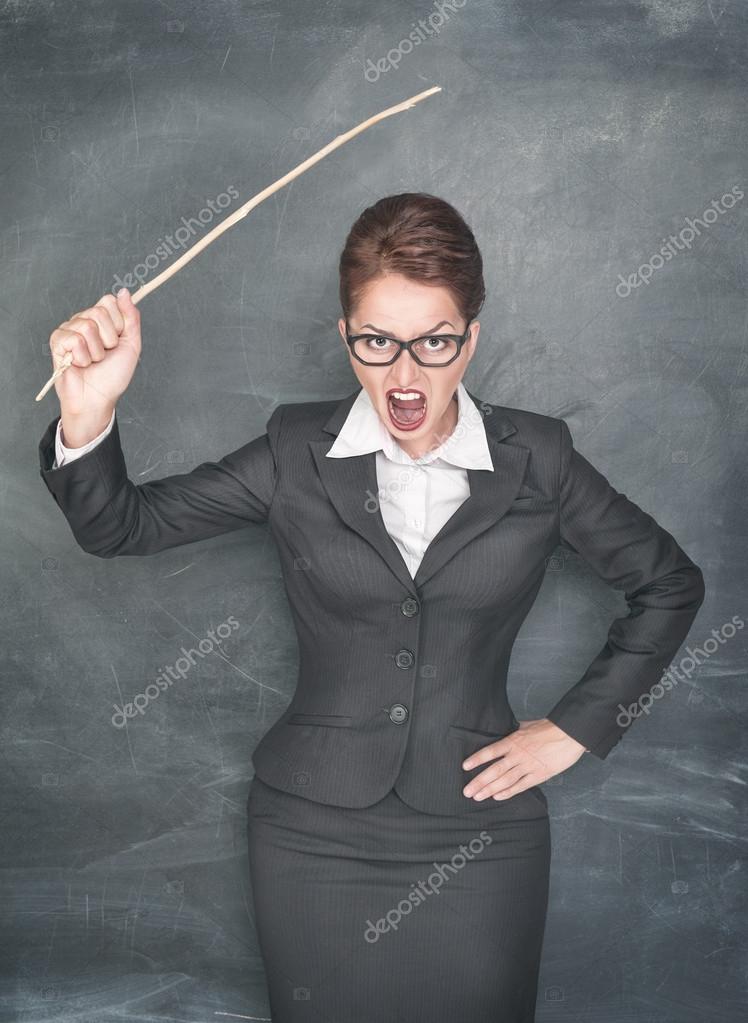 Angry teacher with wooden stick Stock Photo by ©DarkBird 110314708