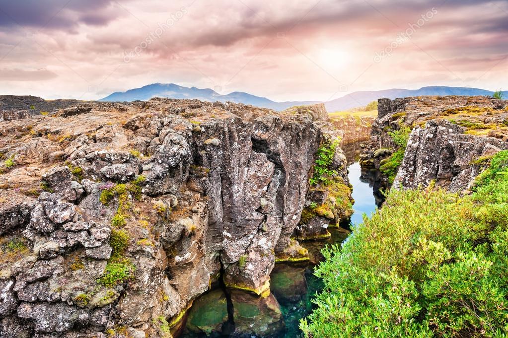 Cliffs and deep fissure in Thingvellir National Park, southern I Stock ...