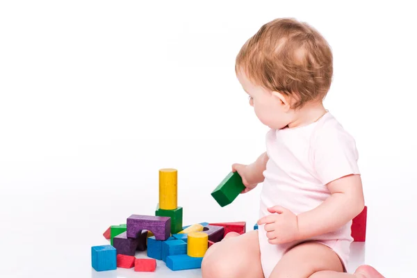 Beautiful baby with mother building with cubes — Stock Photo © Len44ik ...