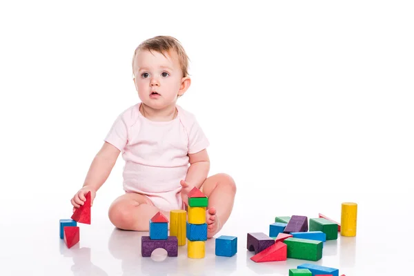 Beautiful baby with mother building with cubes — Stock Photo © Len44ik ...