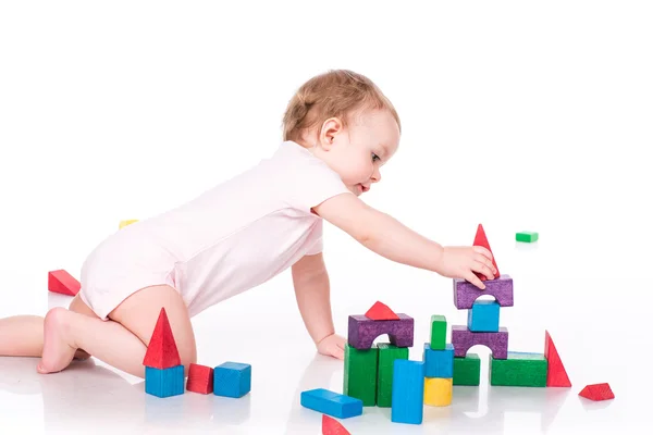 Beautiful baby building with cubes — Stock Photo © Len44ik #67074759