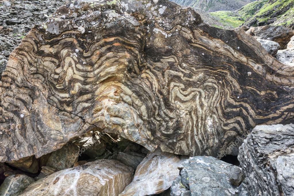 Metamorphic rock with a layered texture — Stock Photo #80927308