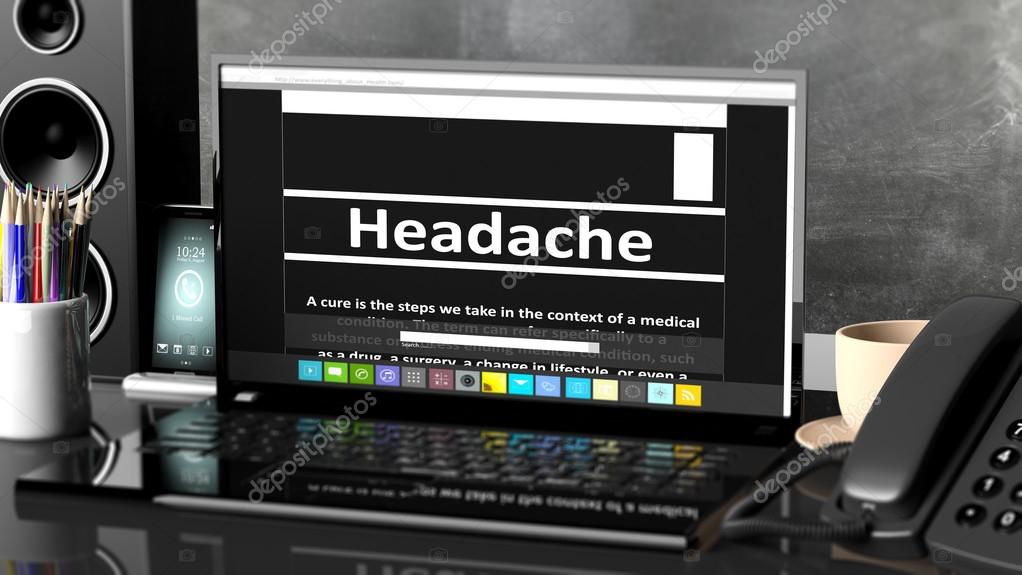 Laptop with Headache information on screen, on desktop with office ...