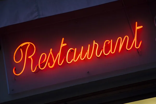 Neon blue restaurant sign closeup — Stock Photo © david_franklin #108989932