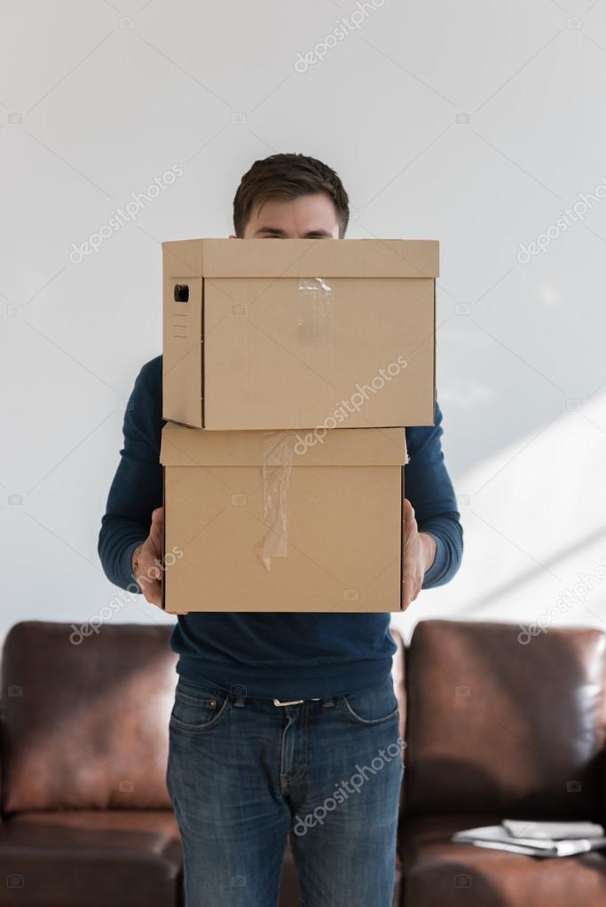 Man holding box — Stock Photo © HASLOO #71928725