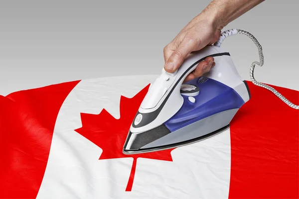 Ironing Out the Wrinkles in U.S. Flag — Stock Photo © Feverpitch #2328470