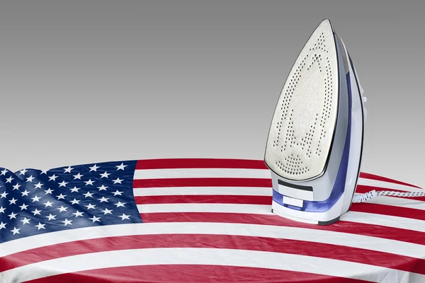 Ironing Out the Wrinkles in U.S. Flag — Stock Photo © Feverpitch #2328470