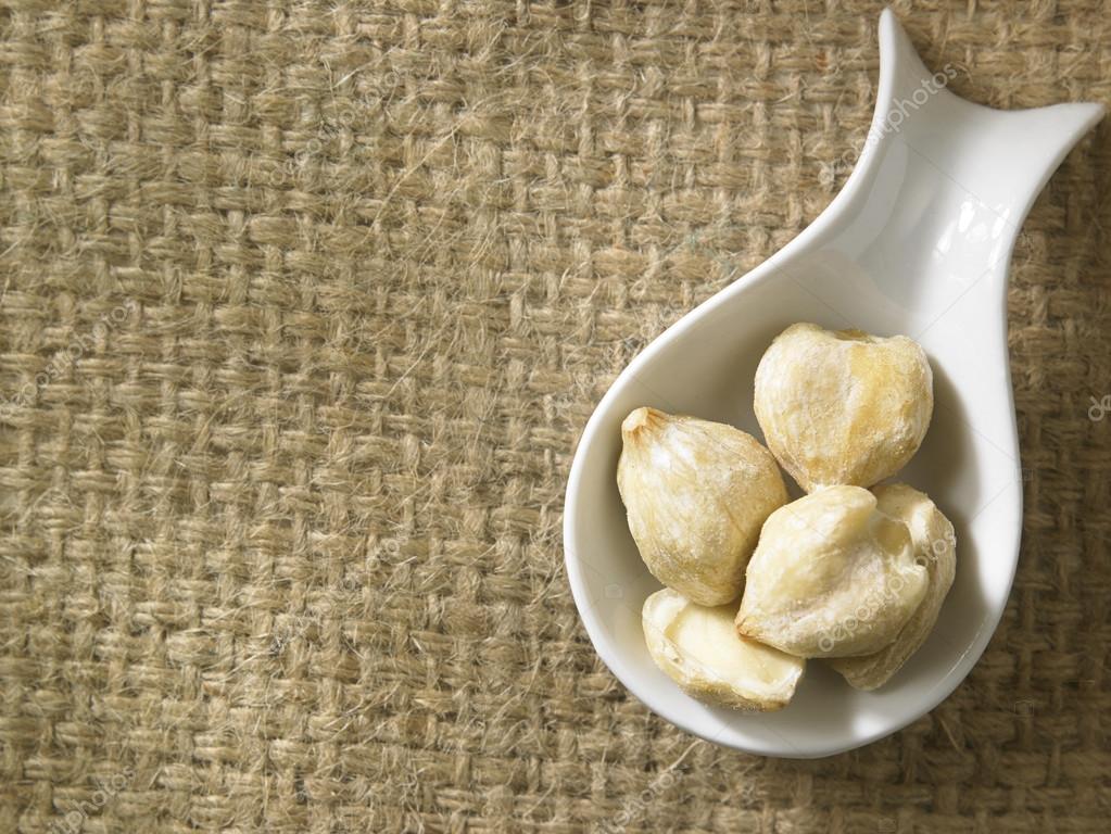 Hulled raw candlenuts — Stock Photo © eskaylim #118357342