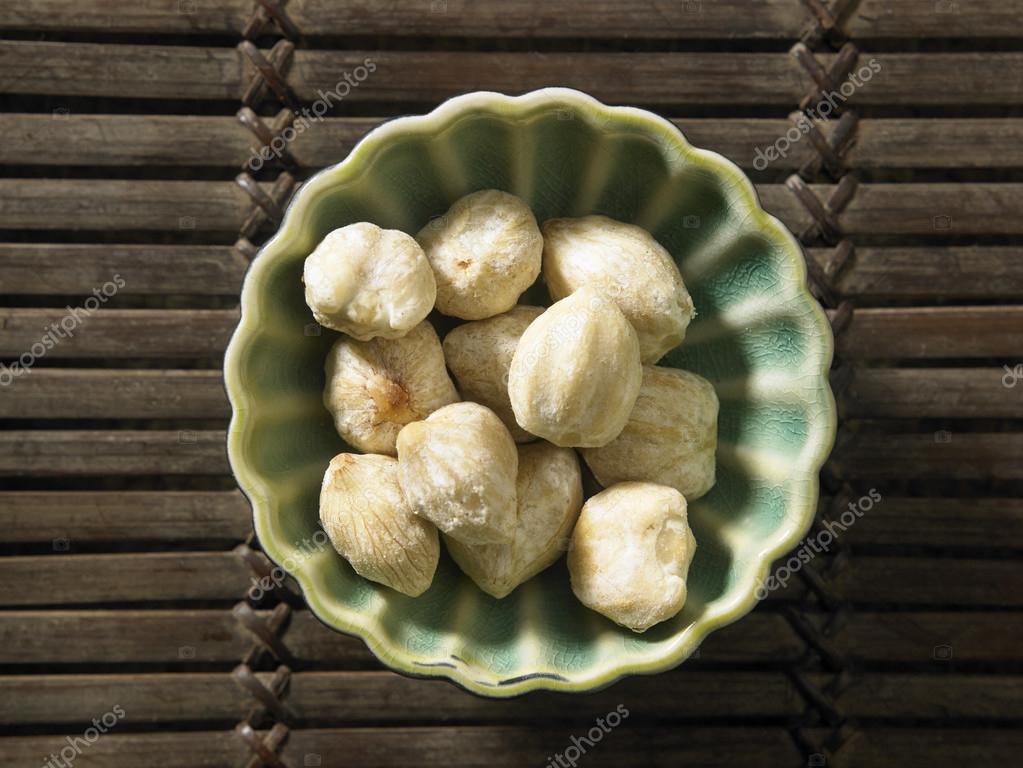 Hulled raw candlenuts — Stock Photo © eskaylim #118358760