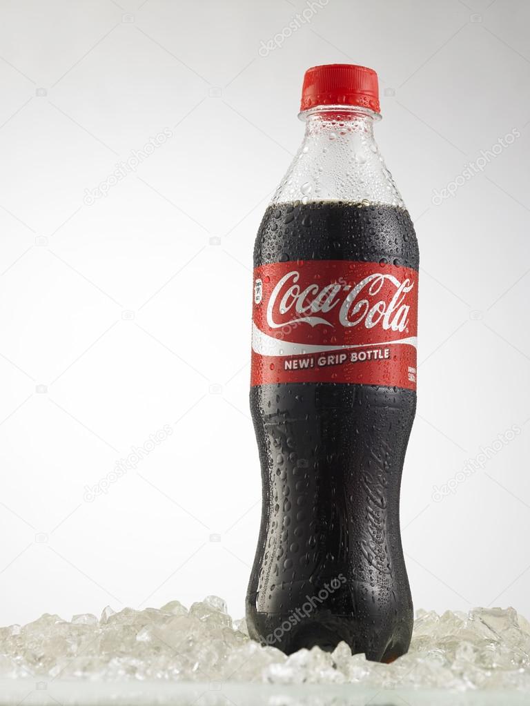 Coca cola bottle — Stock Editorial Photo © eskaylim #81881594