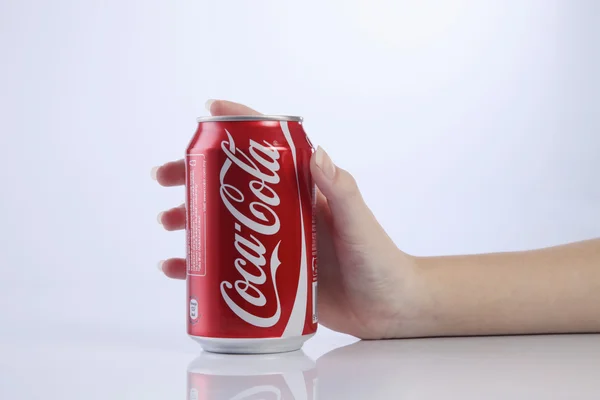 Hand holding coca cola Stock Photos, Royalty Free Hand holding coca ...