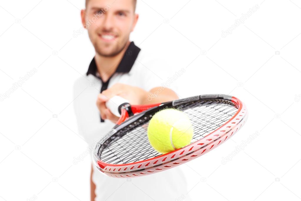 Tennis player showing racket and ball — Stock Photo © macniak #53576697