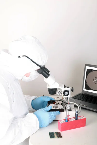 Computer Science Professional Computer Forensics Technician Examines ...