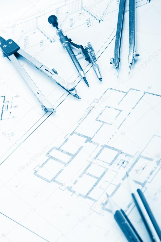 Architectural project, blueprints, blueprint rolls and divider compass ...