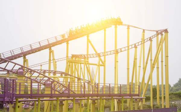 Yellow roller coaster Stock Photos, Royalty Free Yellow roller coaster ...