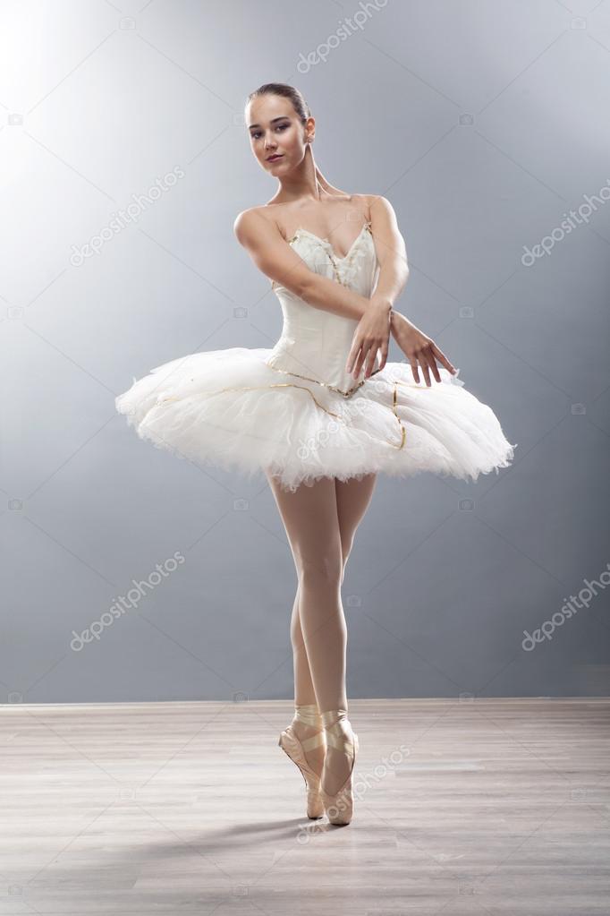 Young ballerina in ballet pose classical dance Stock Photo by ©pyotr021 ...