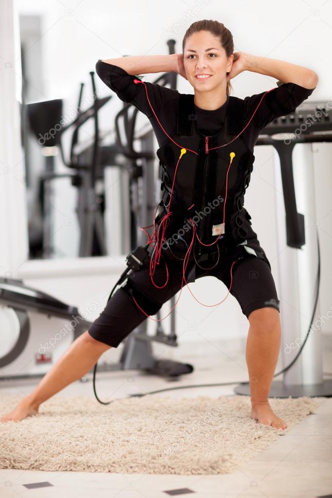 Woman, ems electro muscular stimulation exercise — Stock Photo ...
