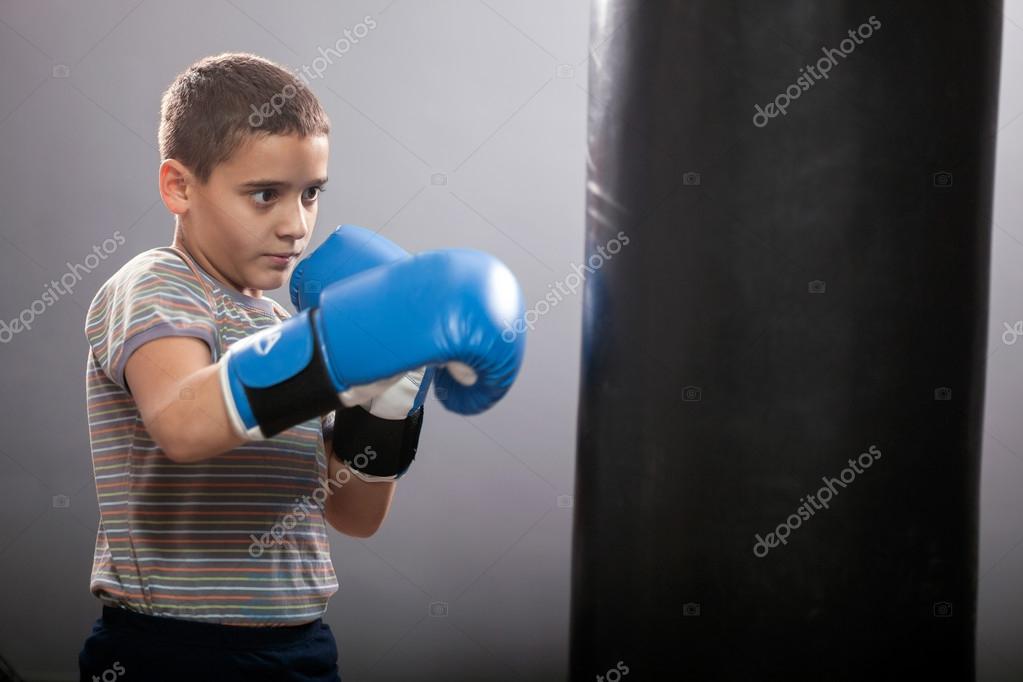 Young child with boxing gloves Stock Photo by ©pyotr021 96884652