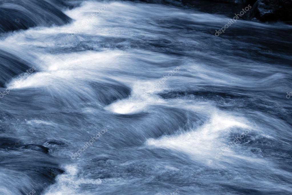 Blue water stream Stock Photo by ©stillfx 91021142