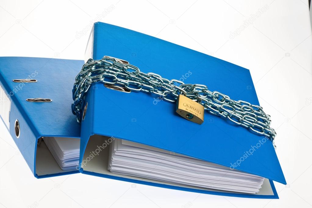 Closed file folder with chain Stock Photo by ©ginasanders 105703946