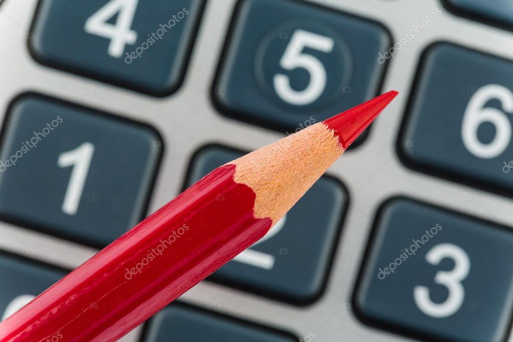 Red pencil and calculator Stock Photo by ©ginasanders 58273915
