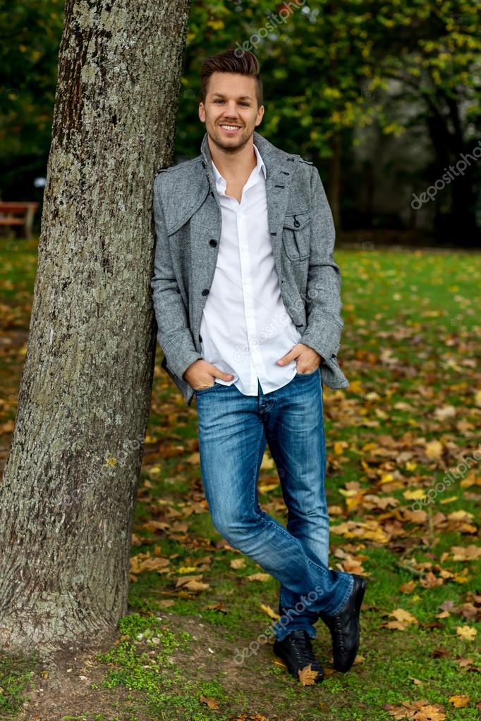 Person Leaning Against A Tree