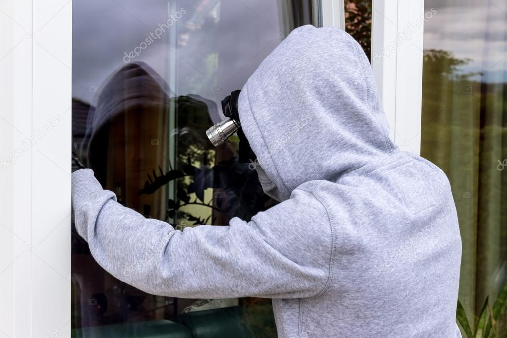 Burglar at a window Stock Photo by ©ginasanders 59181741