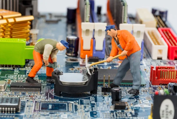 Computer board and construction workers — Stock Photo © ginasanders ...
