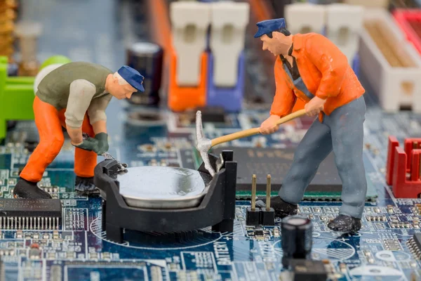 Computer board and construction workers — Stock Photo © ginasanders ...