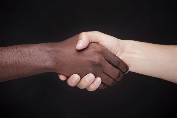 African man's hand shaking white man's hand Stock Photo by ©cristovao ...
