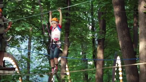 Climbing on trees, outdoor kids game. Kids rope park. Adventure ...