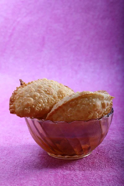 Indian traditional snacks gujiya - Stock Image - Everypixel