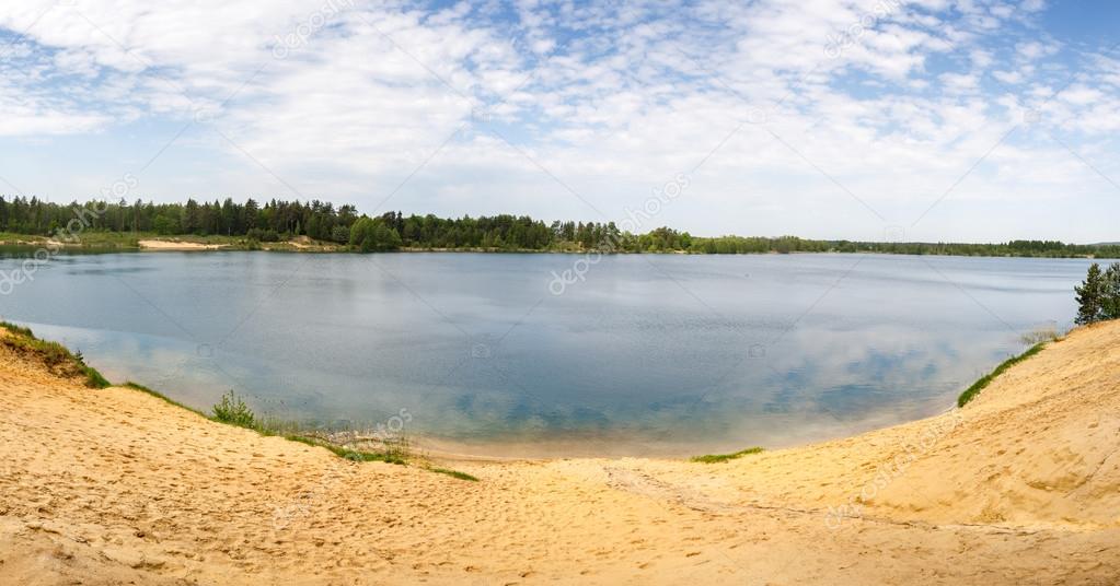 Forest Lake with Sand beach bed bottom — Stock Photo © jenoche #73915783