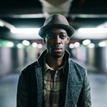 Young handsome afro black man Stock Photo by ©peus 90303780