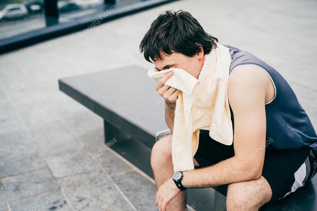 Man drying himself with a towel Stock Photo by ©peus 122538536