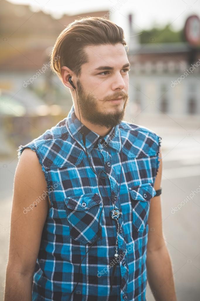 Young handsome bearded hipster man — Stock Photo © peus #57647171