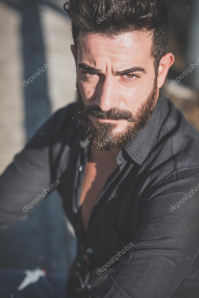 Handsome bearded man Stock Photo by ©peus 60252981