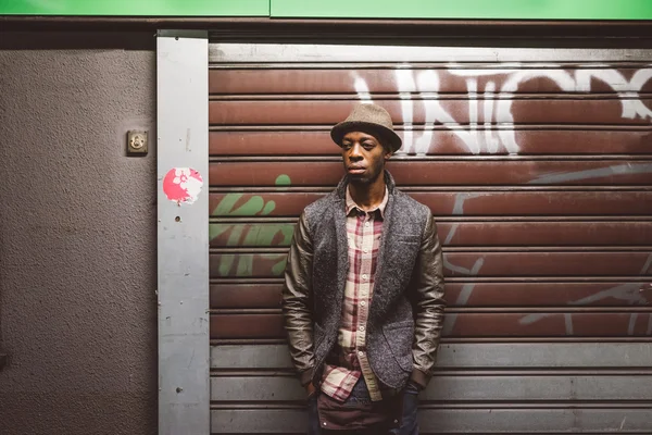 Young handsome afro black man Stock Photo by ©peus 90303780