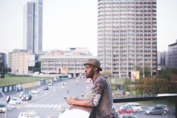 Young handsome afro black man Stock Photo by ©peus 90303780