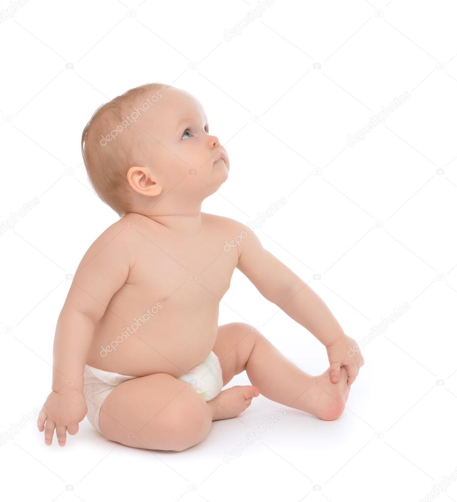 Happy 9 month infant child baby toddler sitting looking up Stock Photo ...