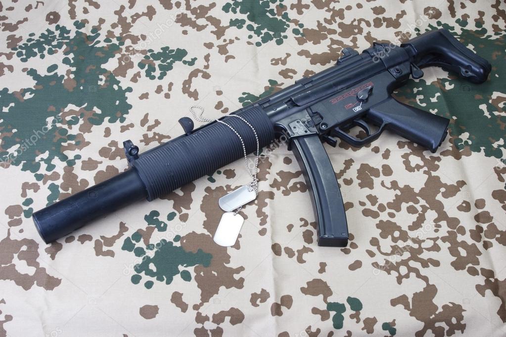 Submachine gun MP5 with silencer — Stock Photo © zim90 #80422142