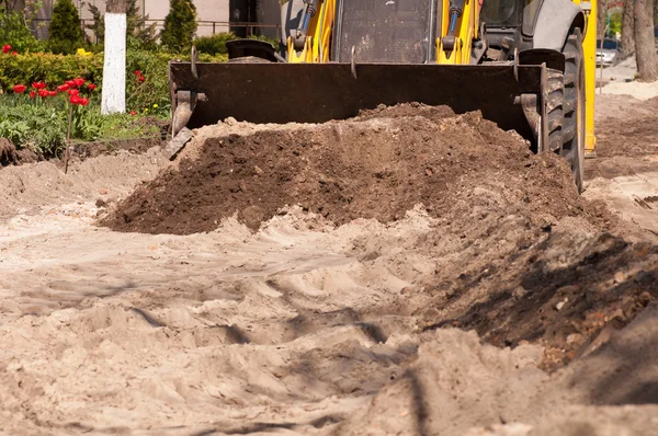 Excavator removes sand - Stock Image - Everypixel