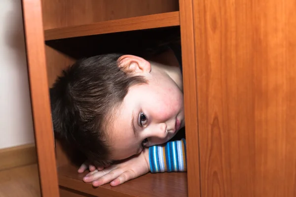 Scared child hiding Stock Photo by ©JanMika 50728403